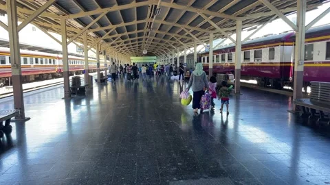 Passengers walking on pavement to train ... | Stock Video | Pond5