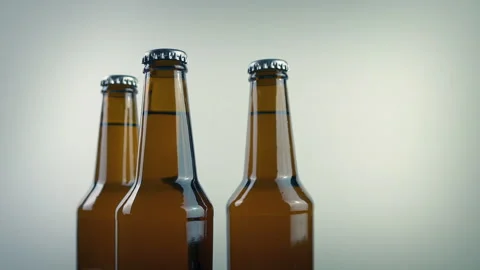 Passing Beer Bottles On Table | Stock Video | Pond5