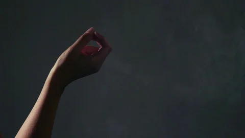 Passing marijuana joint between two hand... | Stock Video | Pond5