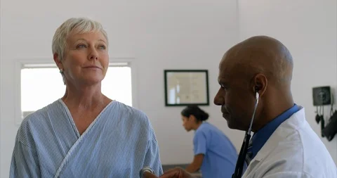 Patient being treated at medical clinic. | Stock Video | Pond5