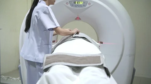 Patient getting up after finishing CT sc... | Stock Video | Pond5