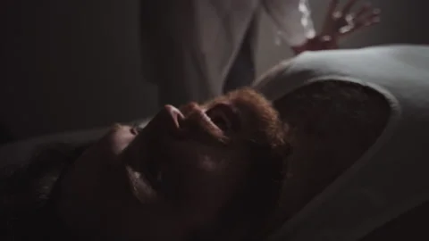 Patient Getting Tied To Hospital Bed | Stock Video | Pond5