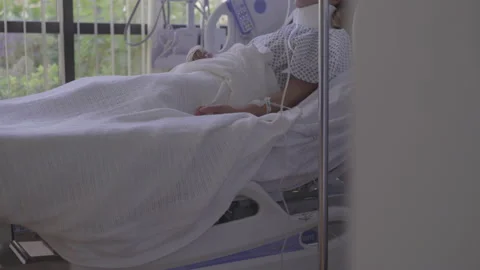 Patient Lays In Hospital Bed | Stock Video | Pond5