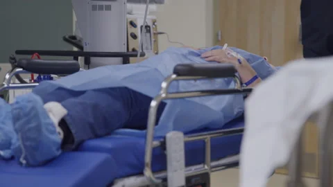 Patient Lying on Hospital Bed | Stock Video | Pond5