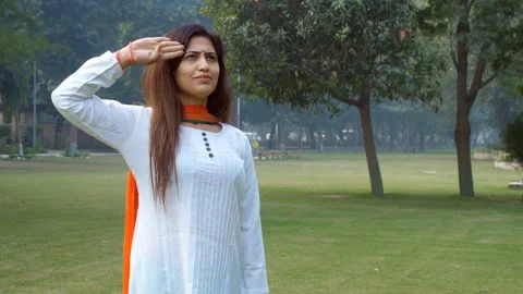 A patriotic lady saluting the Indian Nat... | Stock Video | Pond5