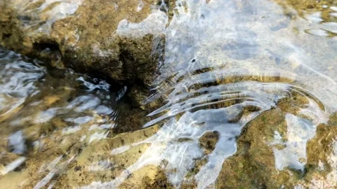 Rock Water Flow Stock Footage ~ Royalty Free Stock Videos | Pond5