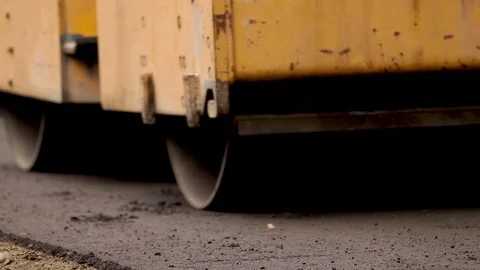 The paver mover on a flat newly made roa... | Stock Video | Pond5