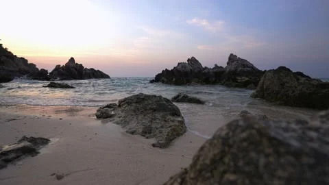 Peaceful moment wave ripple to rock on s... | Stock Video | Pond5