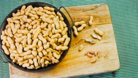 peanuts with bark on a retro tray. Wave ... | Stock Video | Pond5