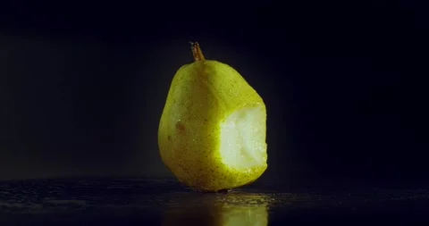 Pear. A bitten fruit. Roundshot circa 36... | Stock Video | Pond5
