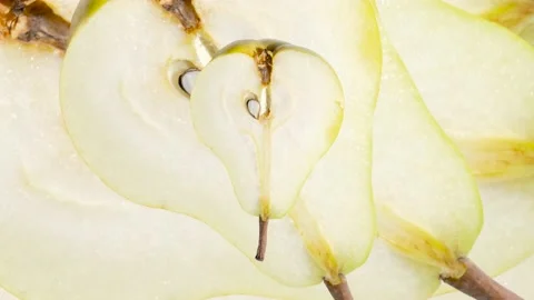 Pear slices with stem seamless loop zoom... | Stock Video | Pond5