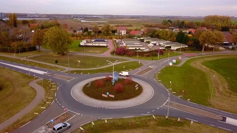 Pedestal shot of a roundabout with cars ... | Stock Video | Pond5