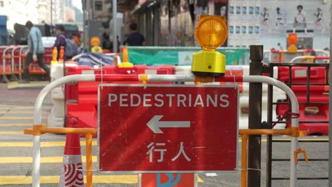 Pedestrian safety sign in a construction... | Stock Video | Pond5