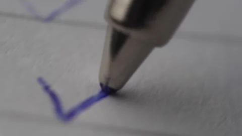 Pen Drawing a Check Mark on Paper. | Stock Video | Pond5