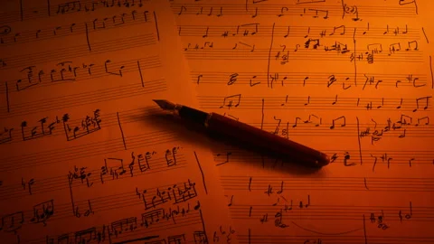 Pen On Hand-Written Sheet Music In Firel... | Stock Video | Pond5