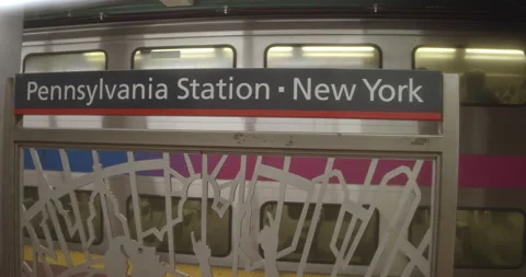 Penn Station Sign and Artwork on Train P... | Stock Video | Pond5