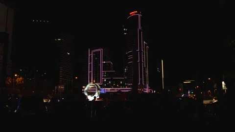 People and cars moving against night vie... | Stock Video | Pond5