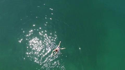 People bathe in the sea. Top view, aeria... | Stock Video | Pond5