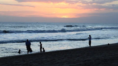 People on the beach swimming and chillin... | Stock Video | Pond5