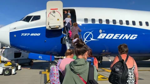 People boarding and going up the stairs ... | Stock Video | Pond5