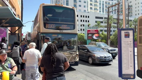People boarding Deuce bus system downtow... | Stock Video | Pond5