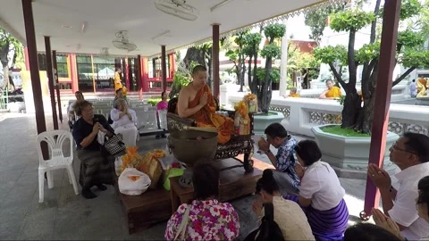 People bow to Buddhist monk in praying, ... | Stock Video | Pond5