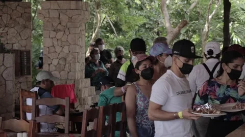 People at Buffet Restaurant with Face Ma... | Stock Video | Pond5