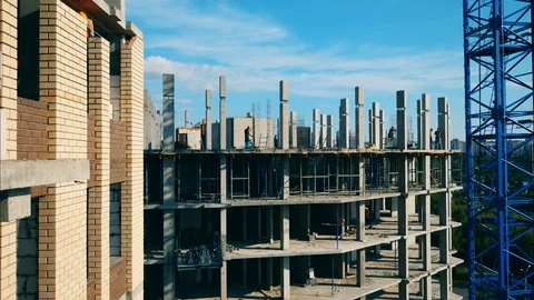 People build a house on a construction s... | Stock Video | Pond5