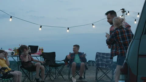 People with children playing charades in... | Stock Video | Pond5