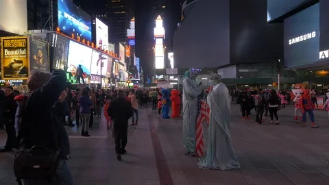 People with costumes in Times Square, Ne... | Stock Video | Pond5
