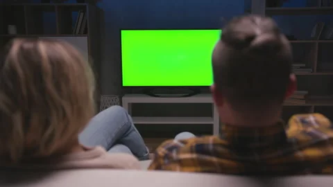 People Couple Watching Green Screen TV S... | Stock Video | Pond5