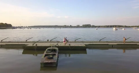 People crossing a small pontoon bridge c... | Stock Video | Pond5