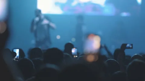 People in the crowd filming a live perfo... | Stock Video | Pond5