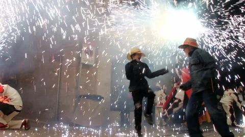 People dance and burn firecrackers at ni... | Stock Video | Pond5