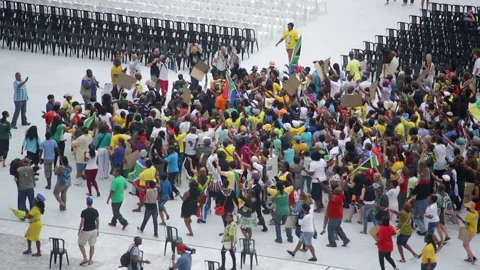people dancing & flag waving, at Mandela... | Stock Video | Pond5