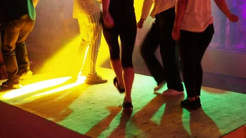 people dancing at night detail of legs a... | Stock Video | Pond5