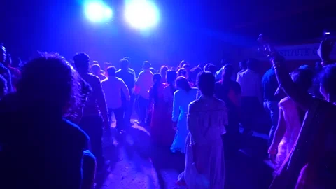 People dancing wildly on the street in t... | Stock Video | Pond5