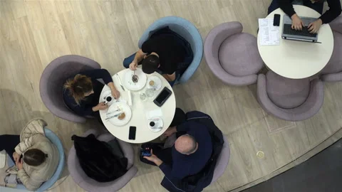 People eat at a table in a restaurant. 4... | Stock Video | Pond5