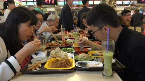 People eat traditional Chinese food in a... | Stock Video | Pond5