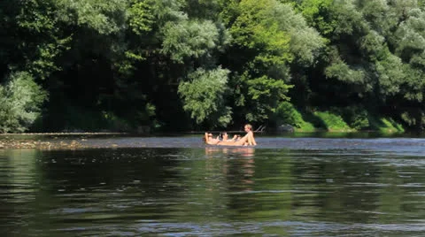 People enjoying and bathing in river su... | Stock Video | Pond5