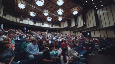 People enter the theater hall, the audie... | Stock Video | Pond5