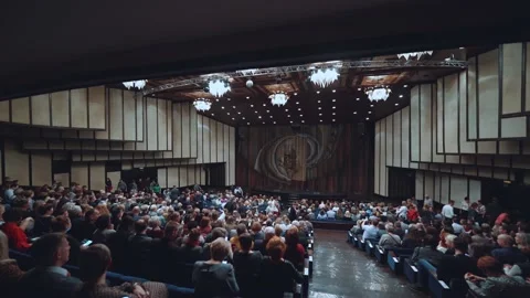 People enter the theater hall, the audie... | Stock Video | Pond5