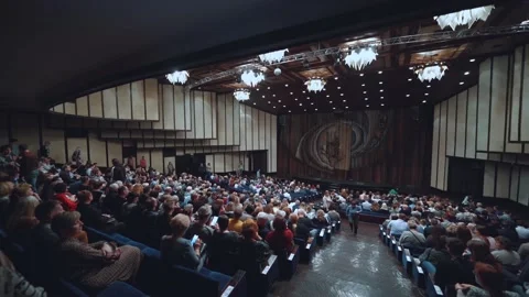 People enter the theater hall, the audie... | Stock Video | Pond5