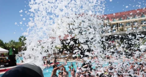 People at foam party in pool at resort h... | Stock Video | Pond5