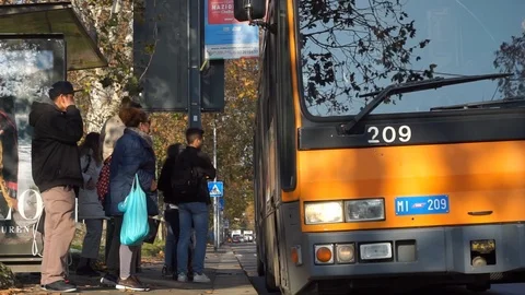 People Getting Off Buses Stock Video Footage | Royalty Free People ...