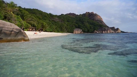 People getting ready to leave the beach ... | Stock Video | Pond5