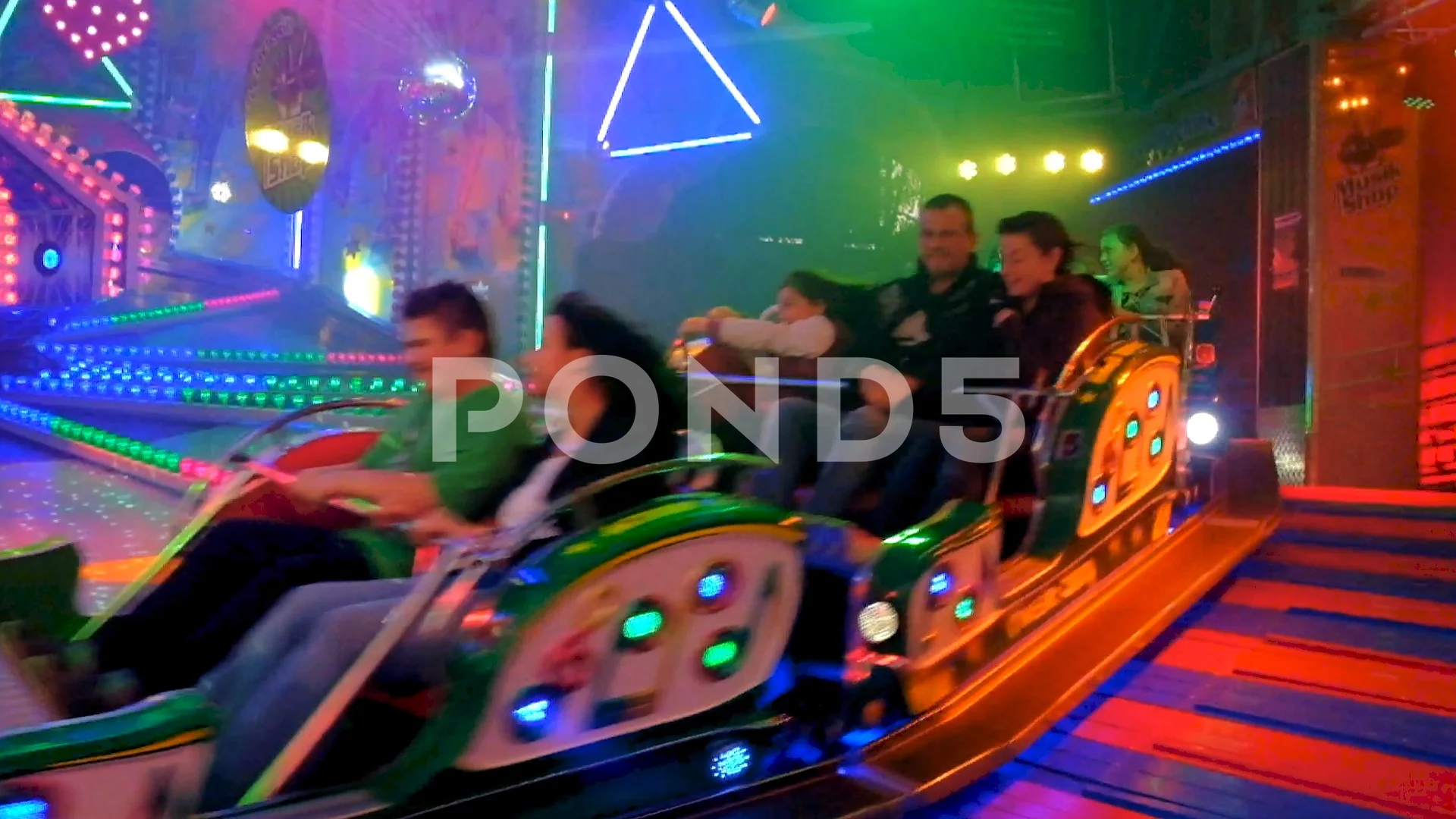 People Having Fun At Theme Park