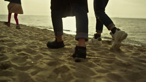 People legs stepping beach at sunset sea... | Stock Video | Pond5