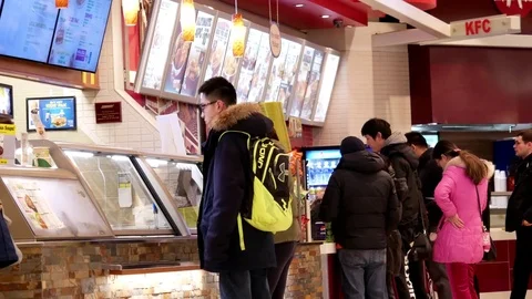 People line up for buying KFC chicken at... | Stock Video | Pond5
