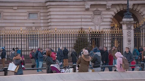 People looking through the gates at Buck... | Stock Video | Pond5